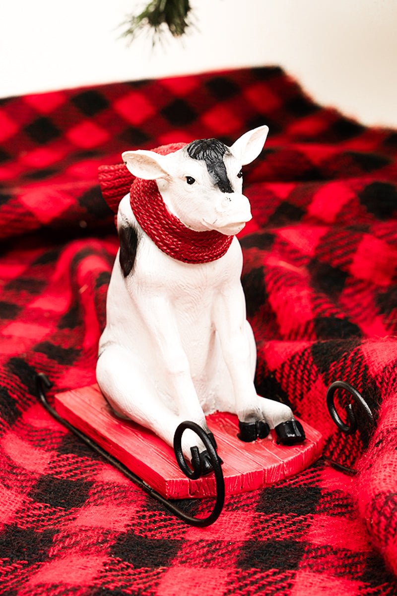 5.5 x 6 Snow Day Sledding Cow Resin Figurine | HH – Howdy Honey
